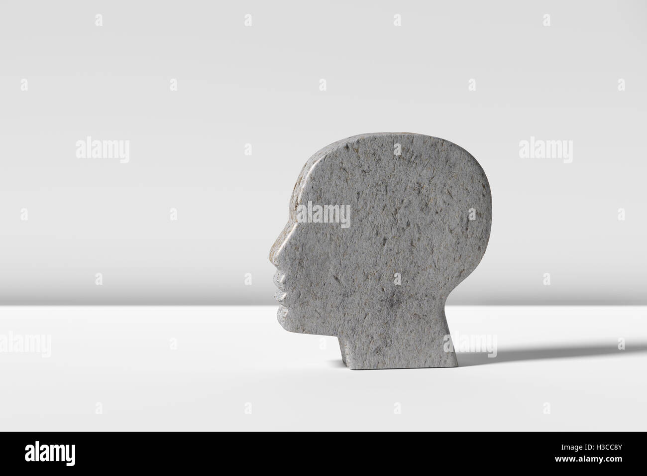 3d rendering of grey figurine of humans head on white background Stock ...