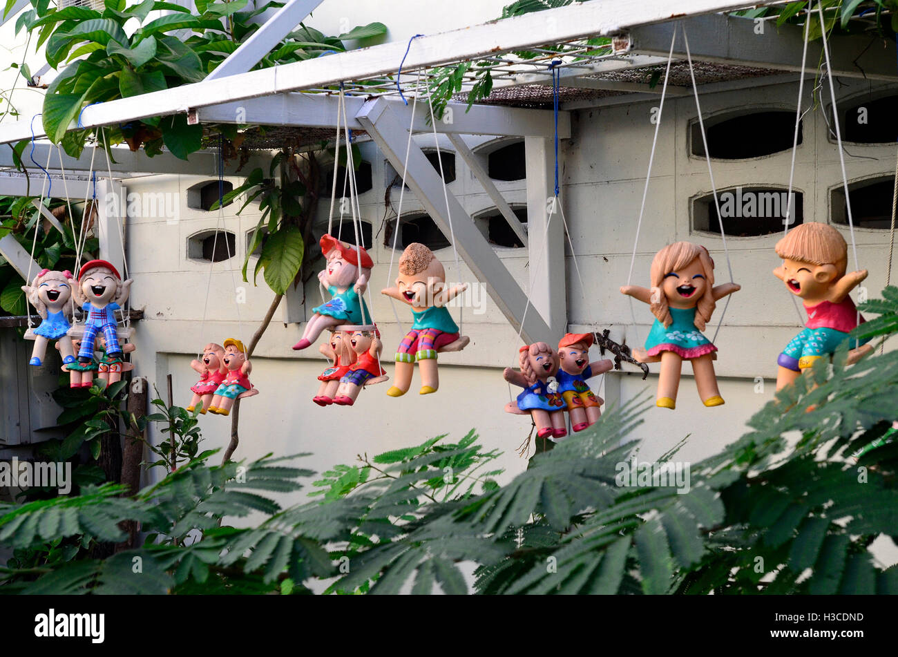 hanging dolls in bangkok, thailand Stock Photo - Alamy