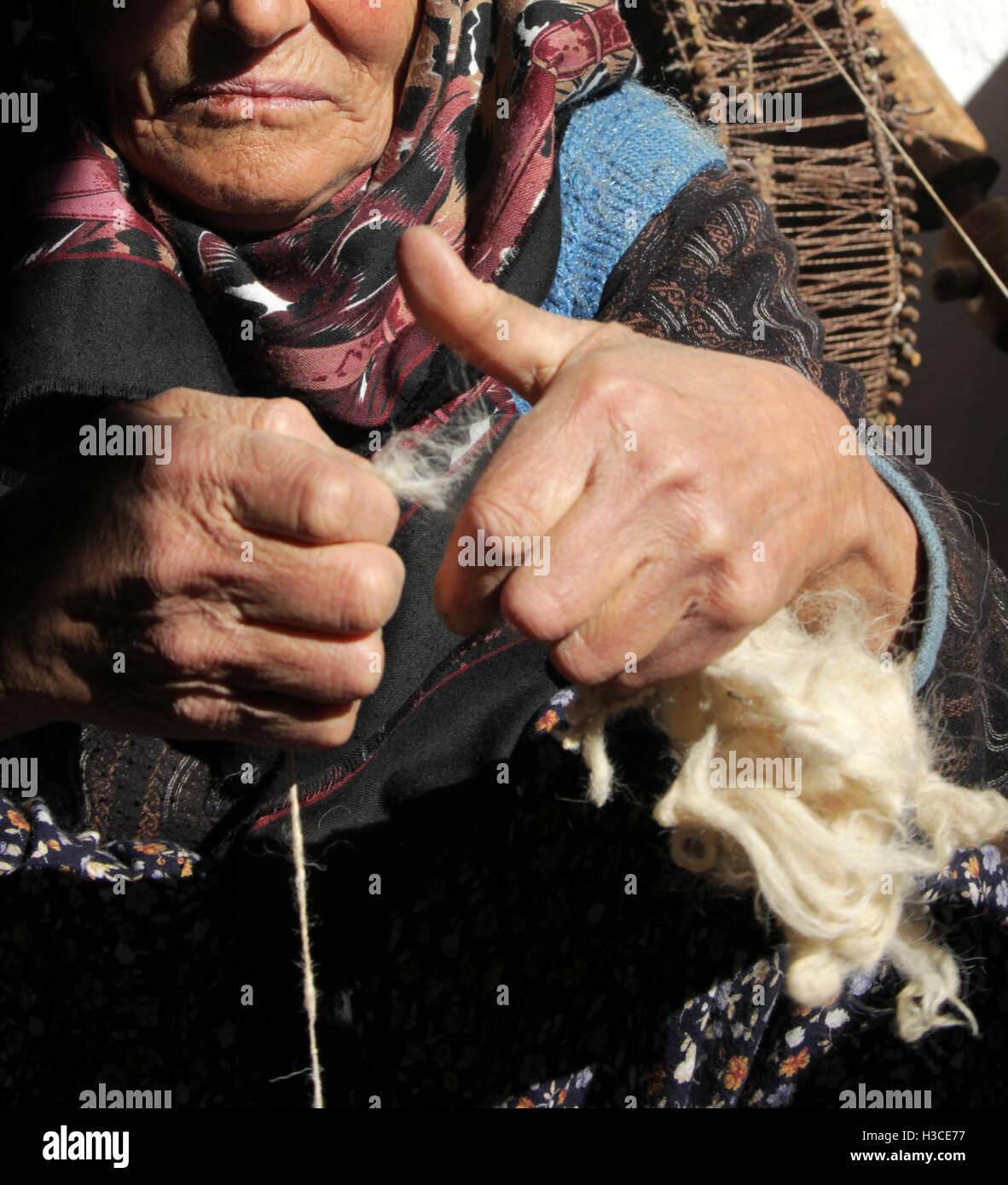 Women spinning wool Stock Photo - Alamy