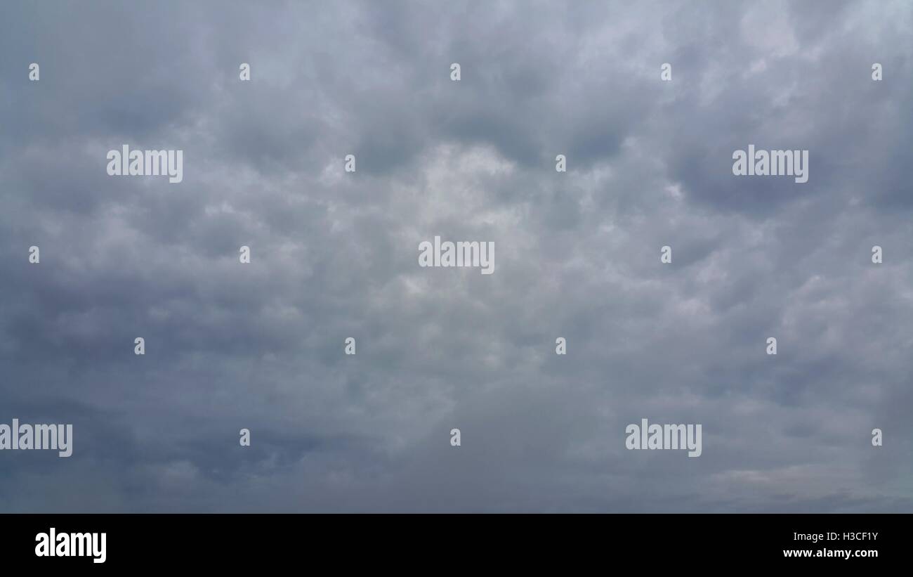 Dark cloudy sky in rainy season Stock Photo - Alamy