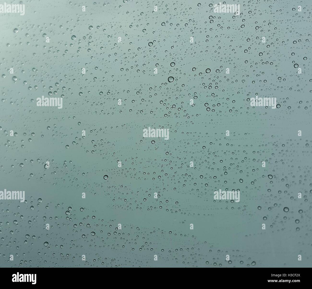 Drops of rain on glass Stock Photo - Alamy