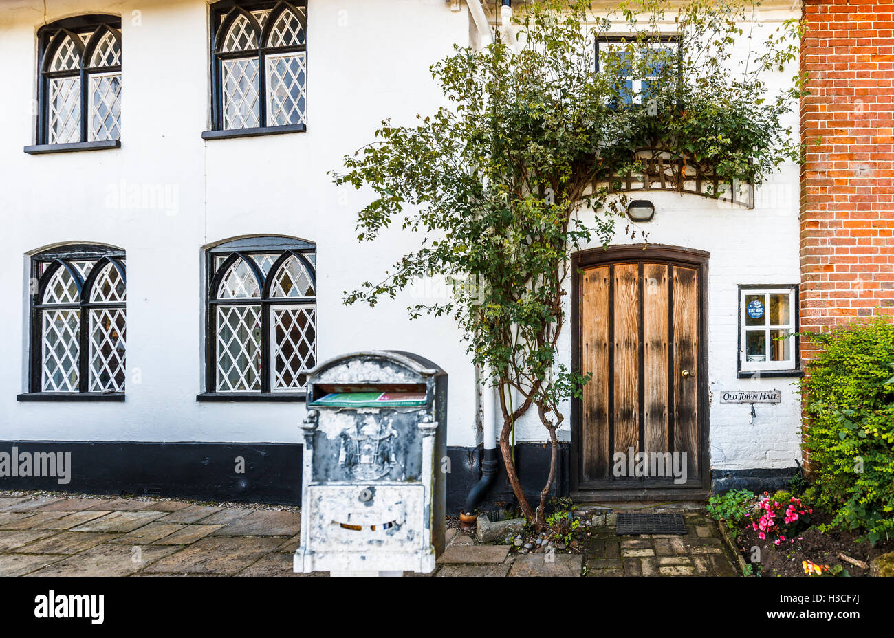 Local landscape: The Old Town Hall, a whitewashed cottage with a wooden ...
