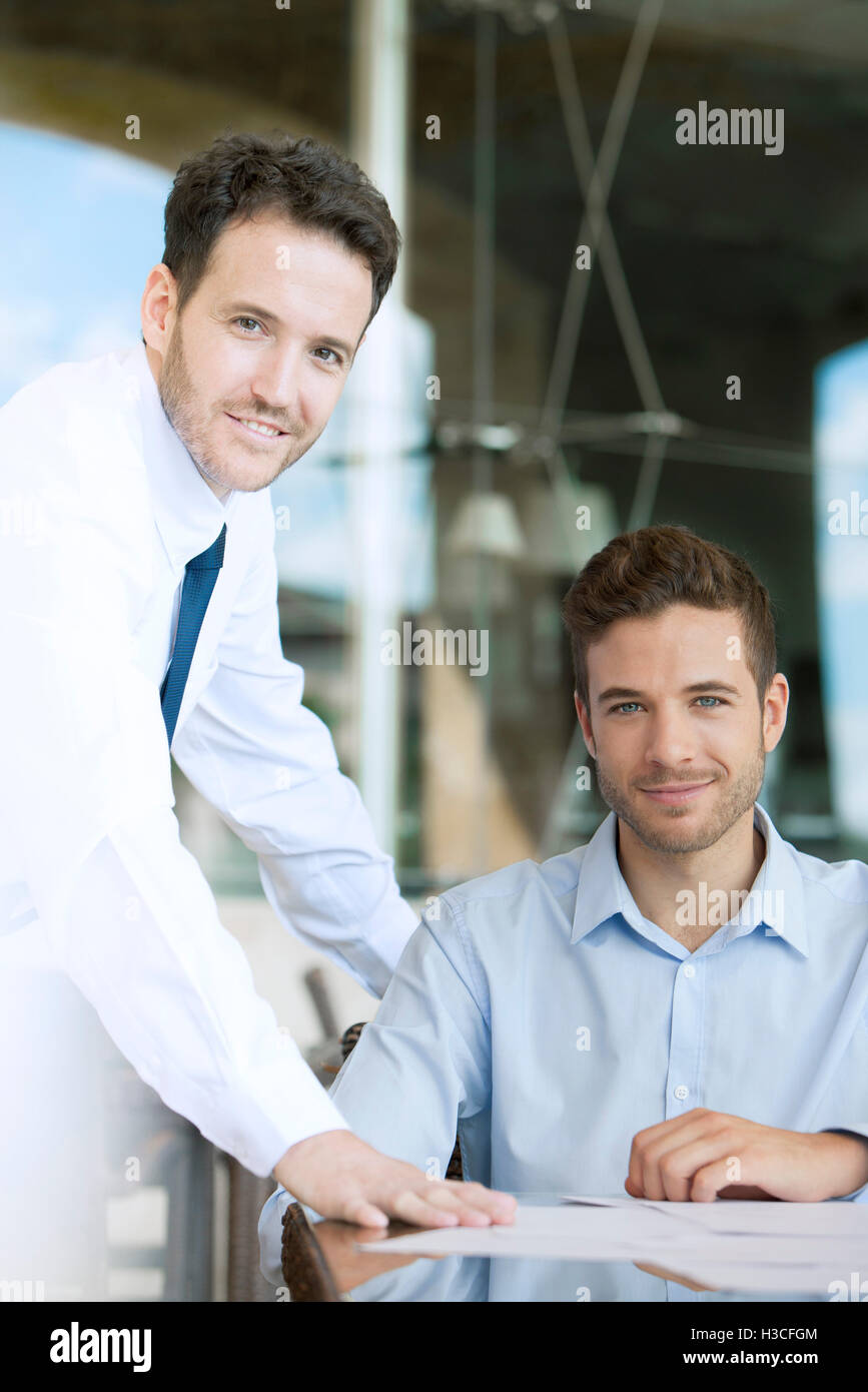 Businessmen in office, portrait Stock Photo - Alamy