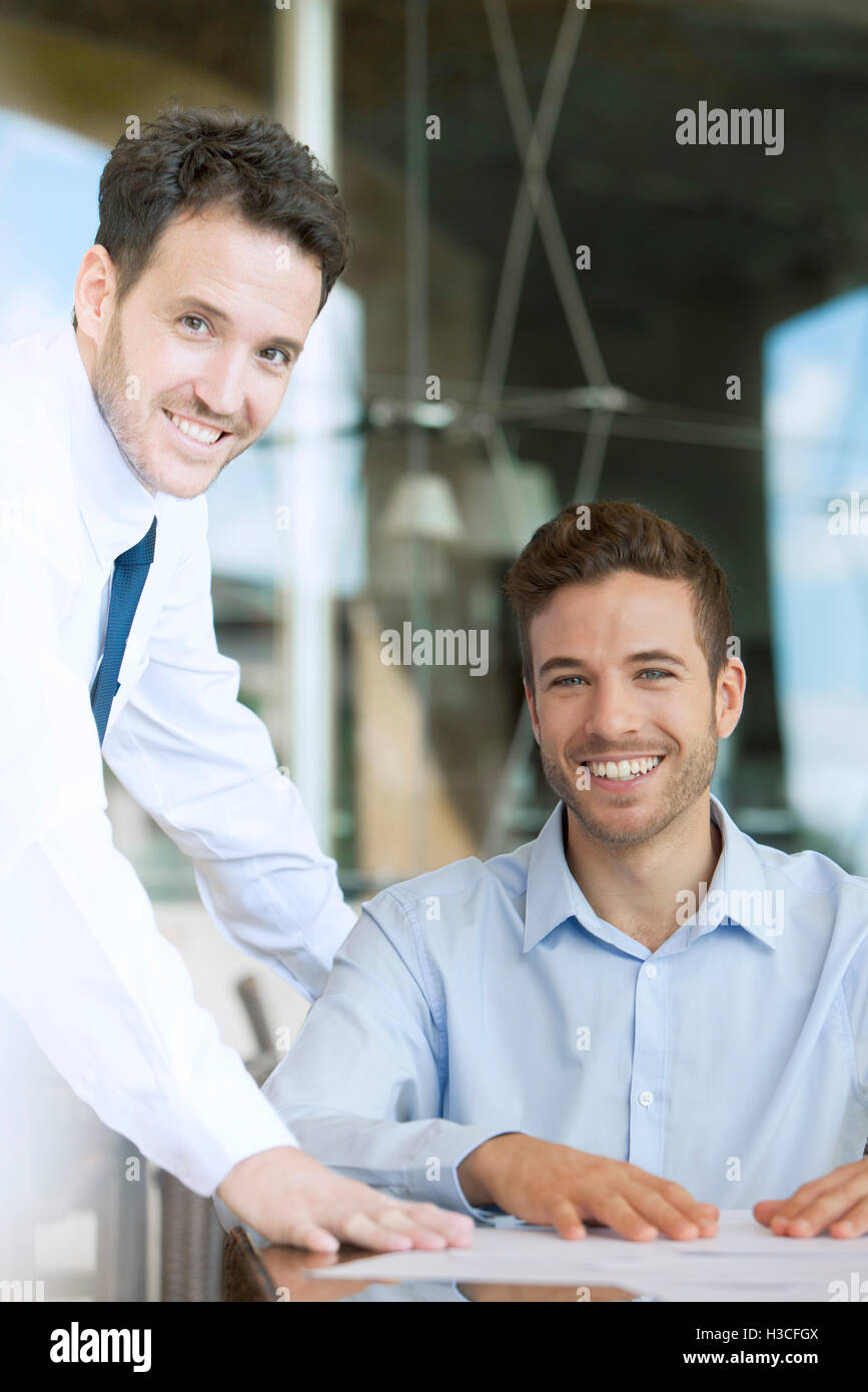 Businessmen in office, portrait Stock Photo - Alamy