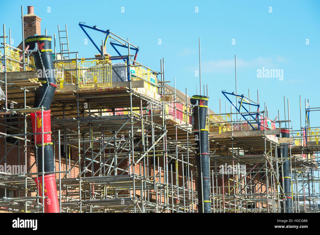 Scaffolding around new build houses in Banbury, Oxfordshire, England ...