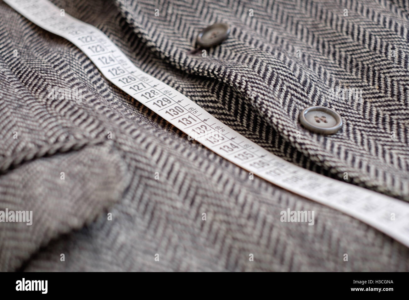 Tailor tools isolated on textile background Stock Photo - Alamy