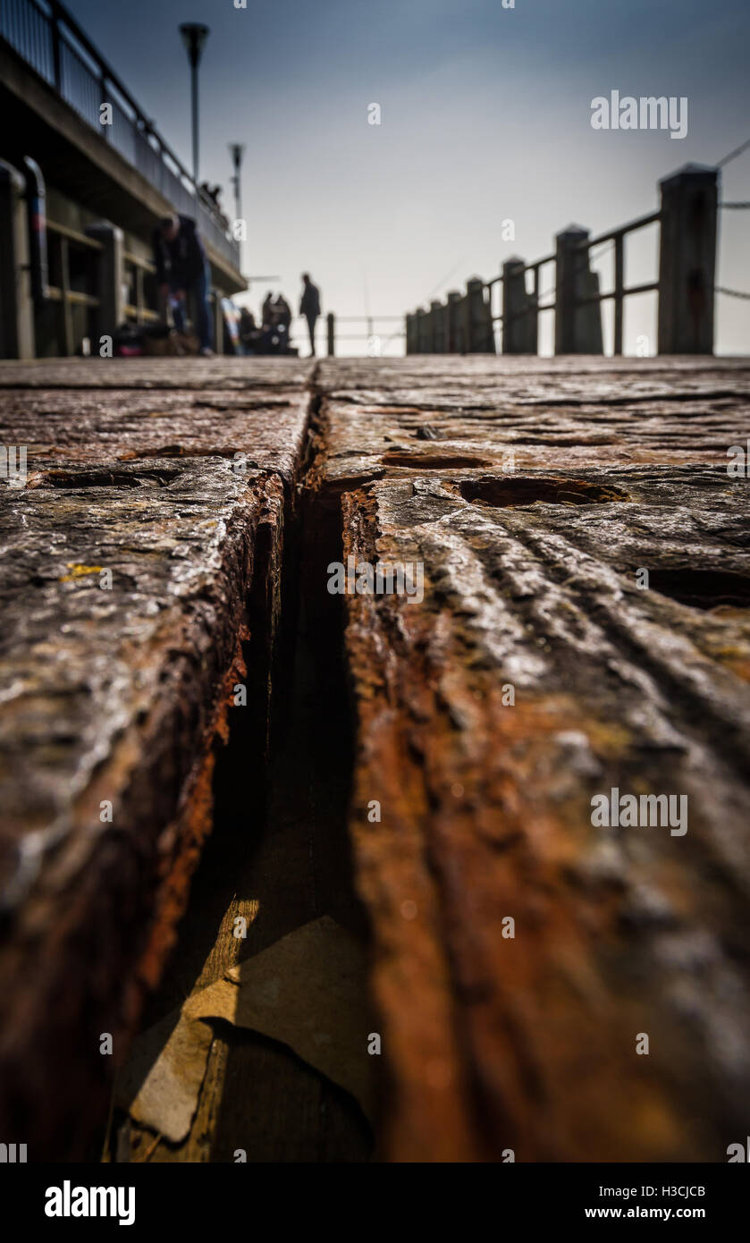 pier rust and rivets on deck with silhouette Stock Photo - Alamy