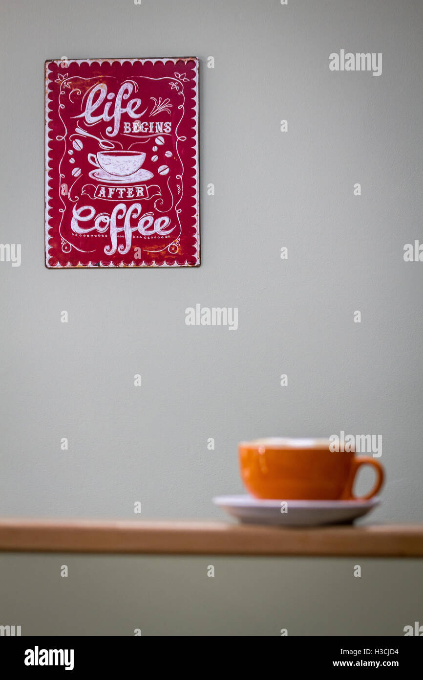 coffee cup and sign Stock Photo - Alamy