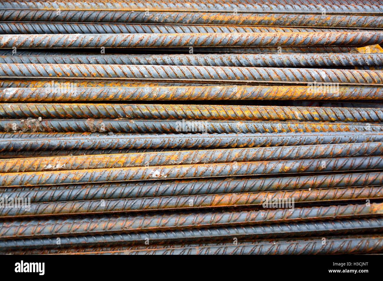 Grunge rusty iron rods lying at construction site Stock Photo - Alamy