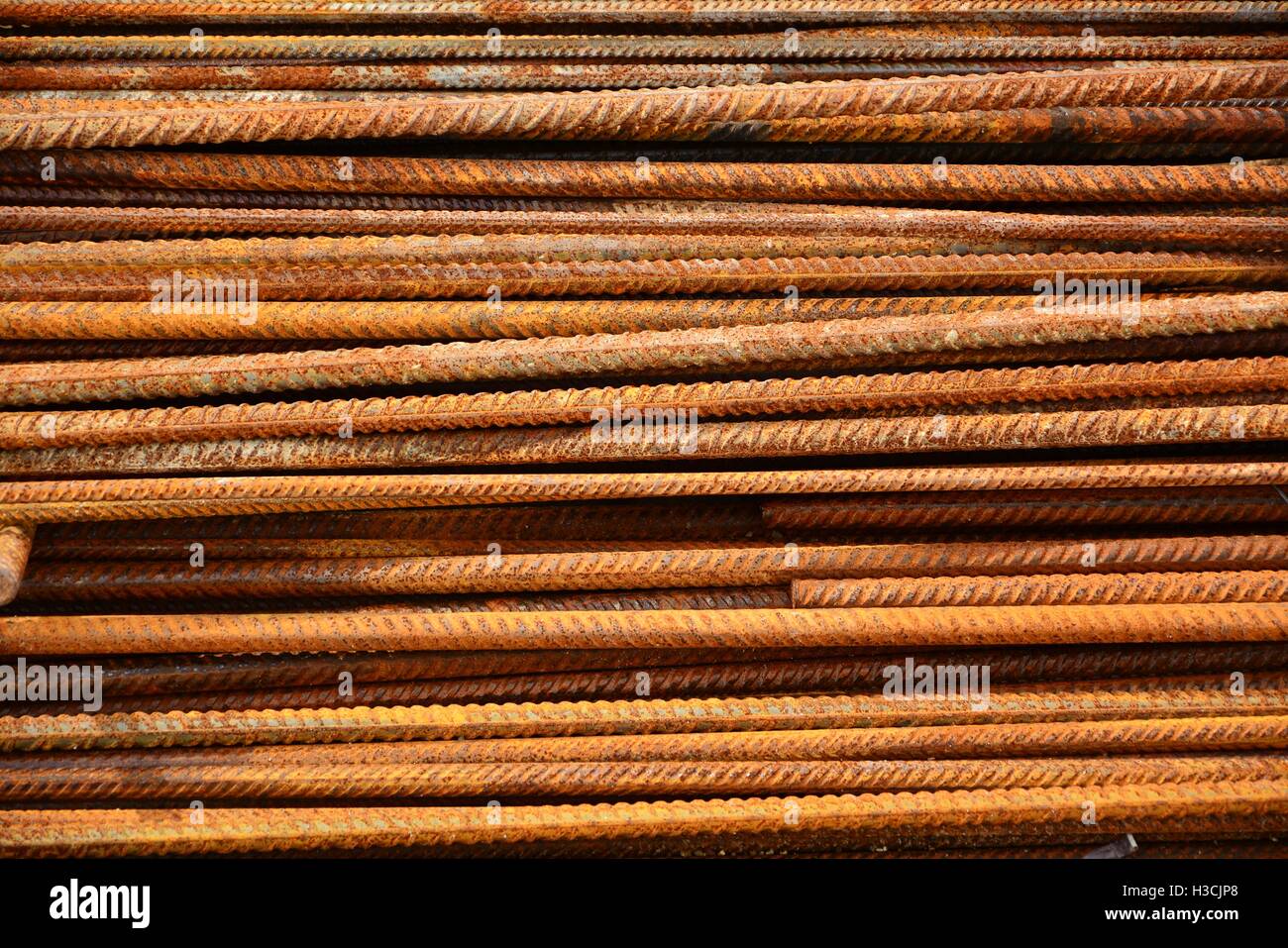 Grunge rusty iron rods lying at construction site Stock Photo - Alamy