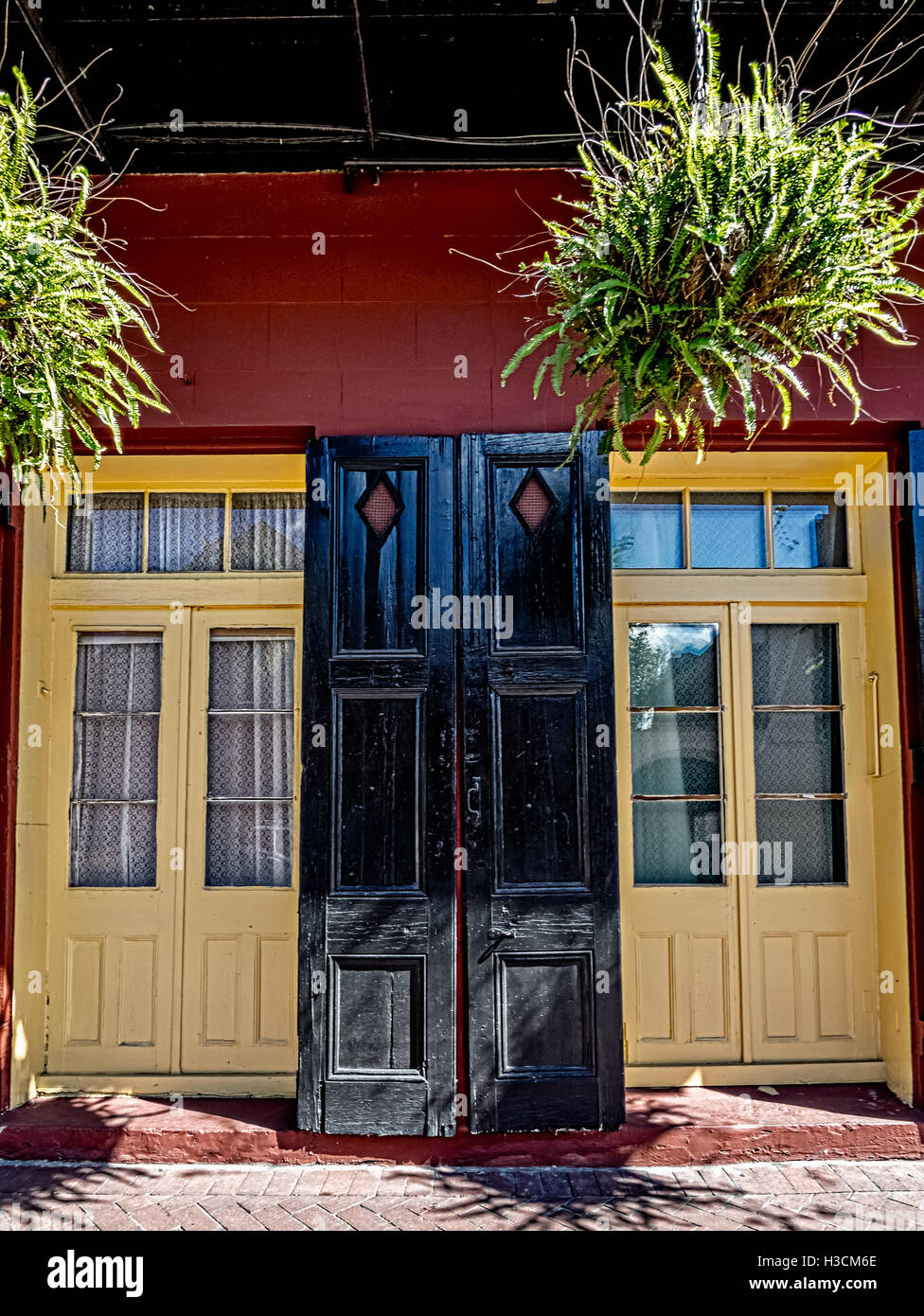 Black door shutters hi-res stock photography and images - Alamy