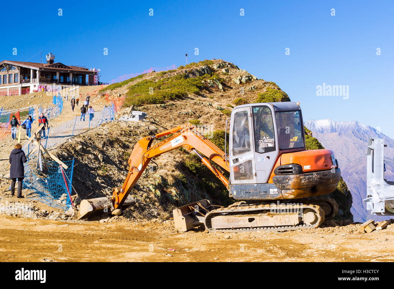SOCHI, RUSSIA - OCTOBER 31, 2015: Small excavator Hitachi conducts ...