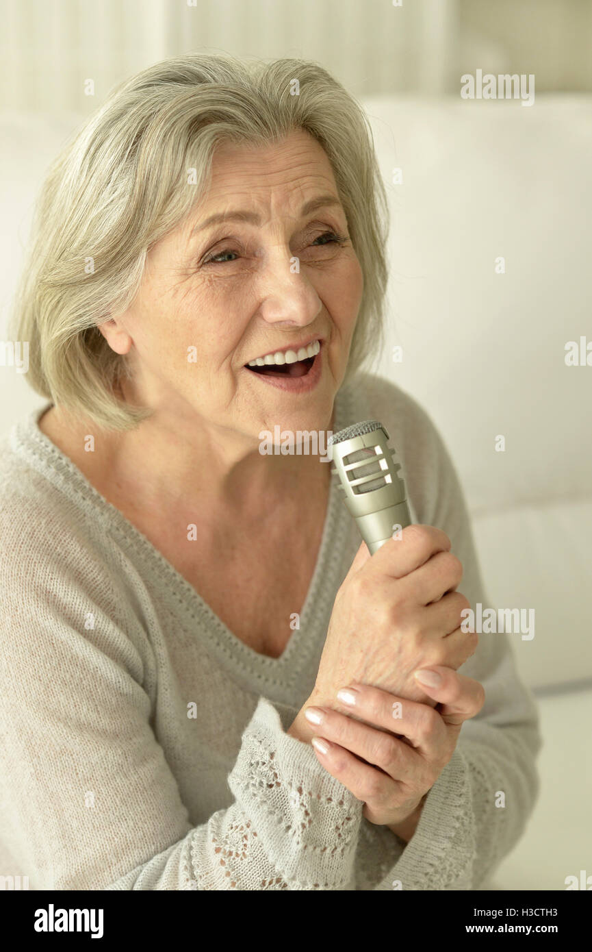 Grey haired mature singer hi-res stock photography and images - Alamy