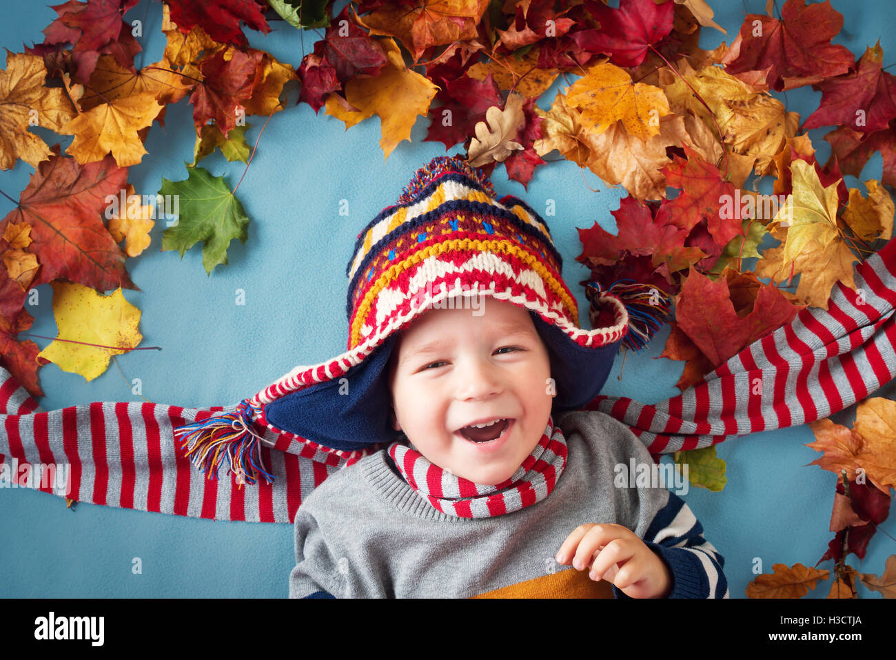 Boy in autumn clothes hi-res stock photography and images - Alamy