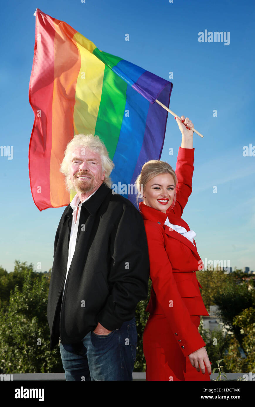 EDITORIAL USE ONLY Richard Branson and Cabin Crew Chloe Clark show ...