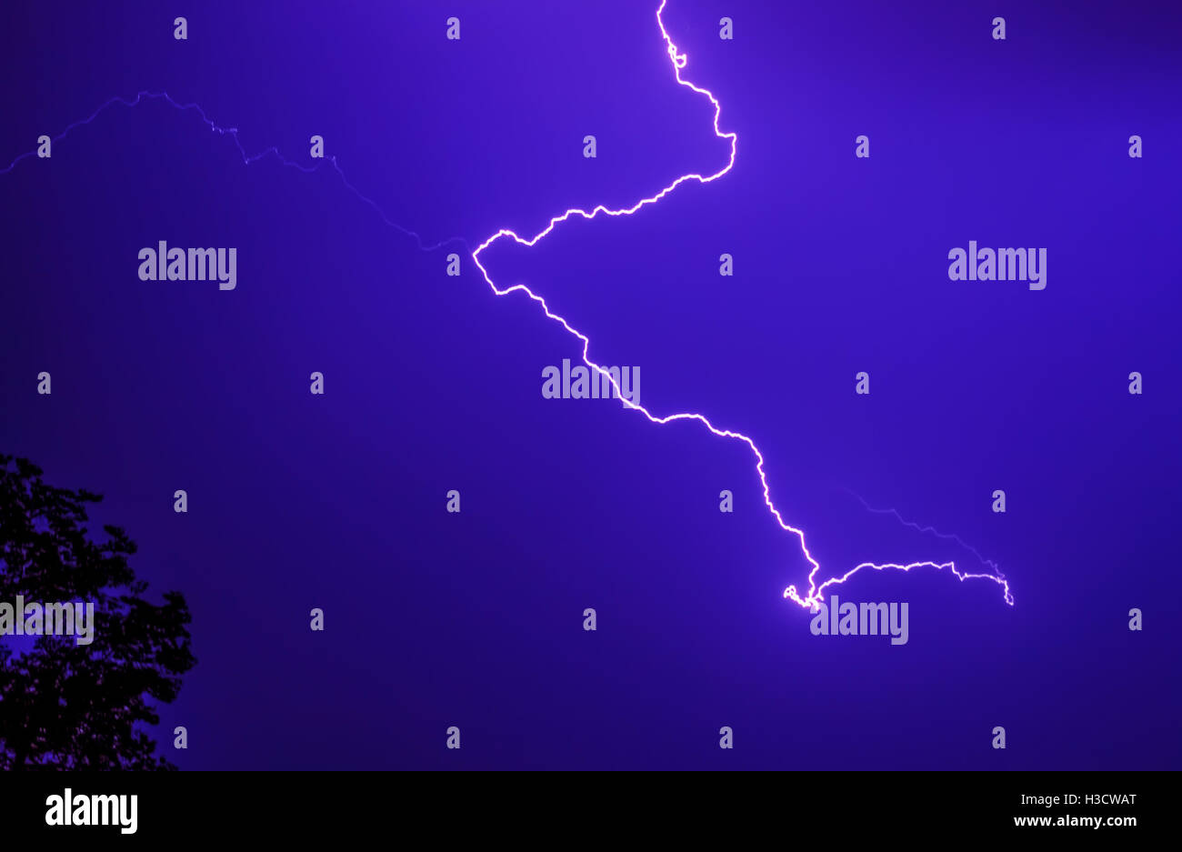 Bright big lightning in storm dark sky Stock Photo - Alamy