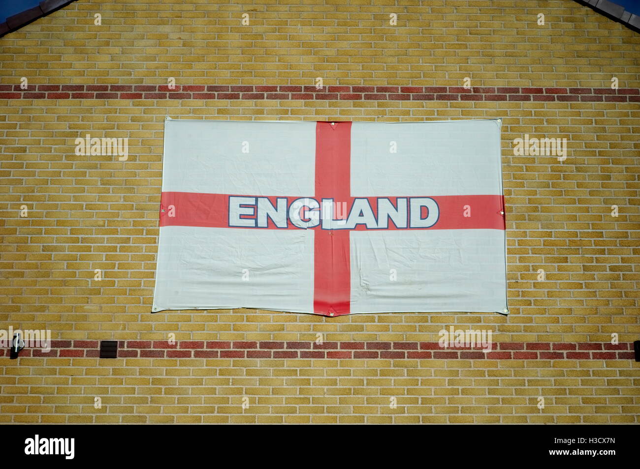 England Flag on Side of House Stock Photo - Alamy