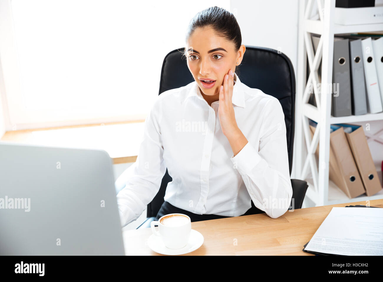 Surprised shocked secretary laptop hi-res stock photography and images ...