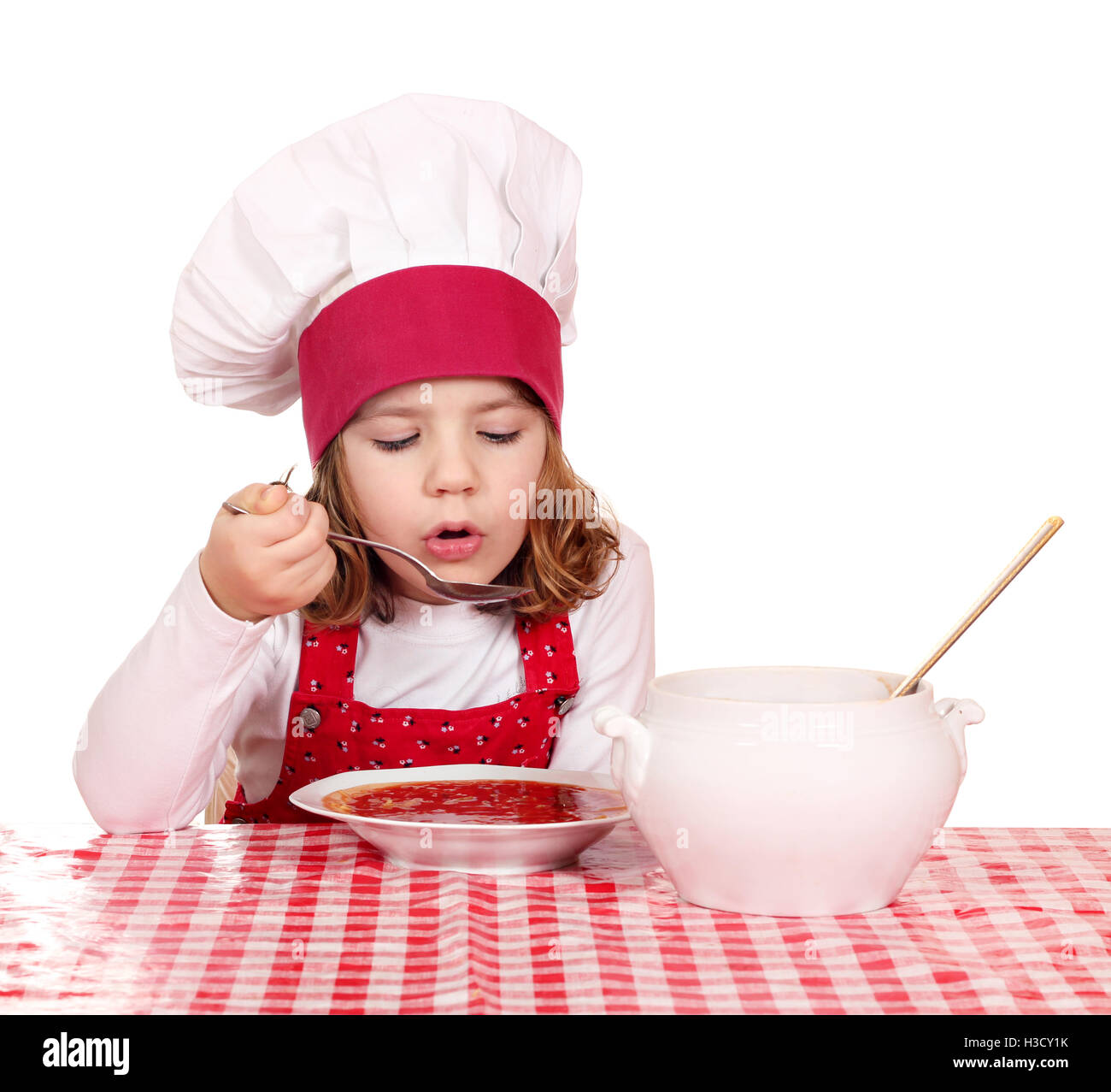 little girl cook eat red tomato soup Stock Photo - Alamy