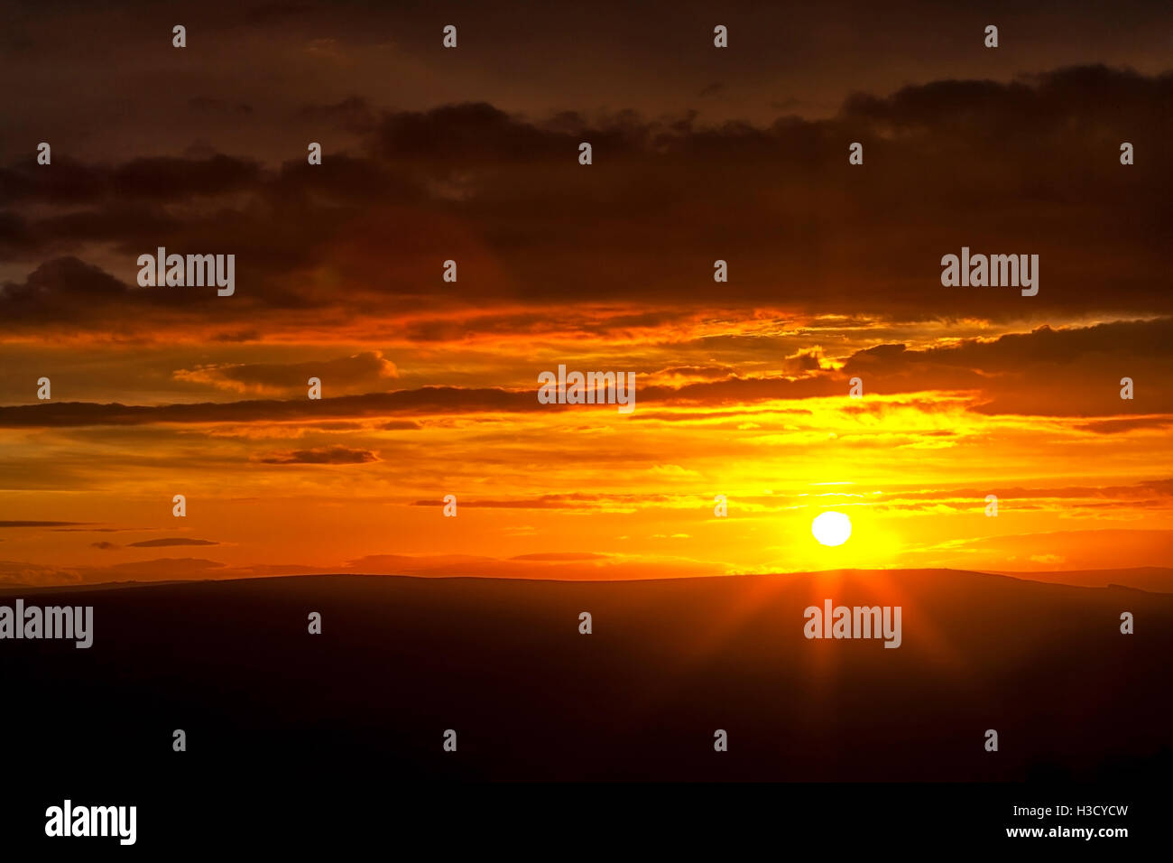 The Sun drops low in the sky creating a beautiful scene at sunset over ...