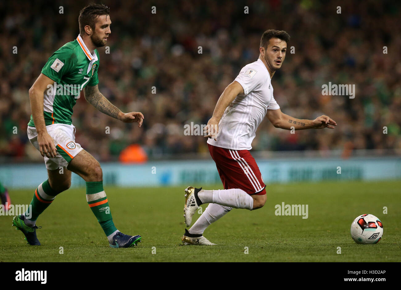 Republic of Ireland's Shane Duffy and Georgia's Valeri Kazaishvili ...