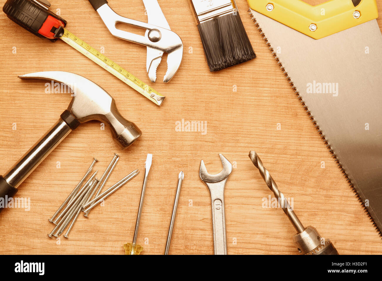 Assorted work tools on wood Stock Photo - Alamy