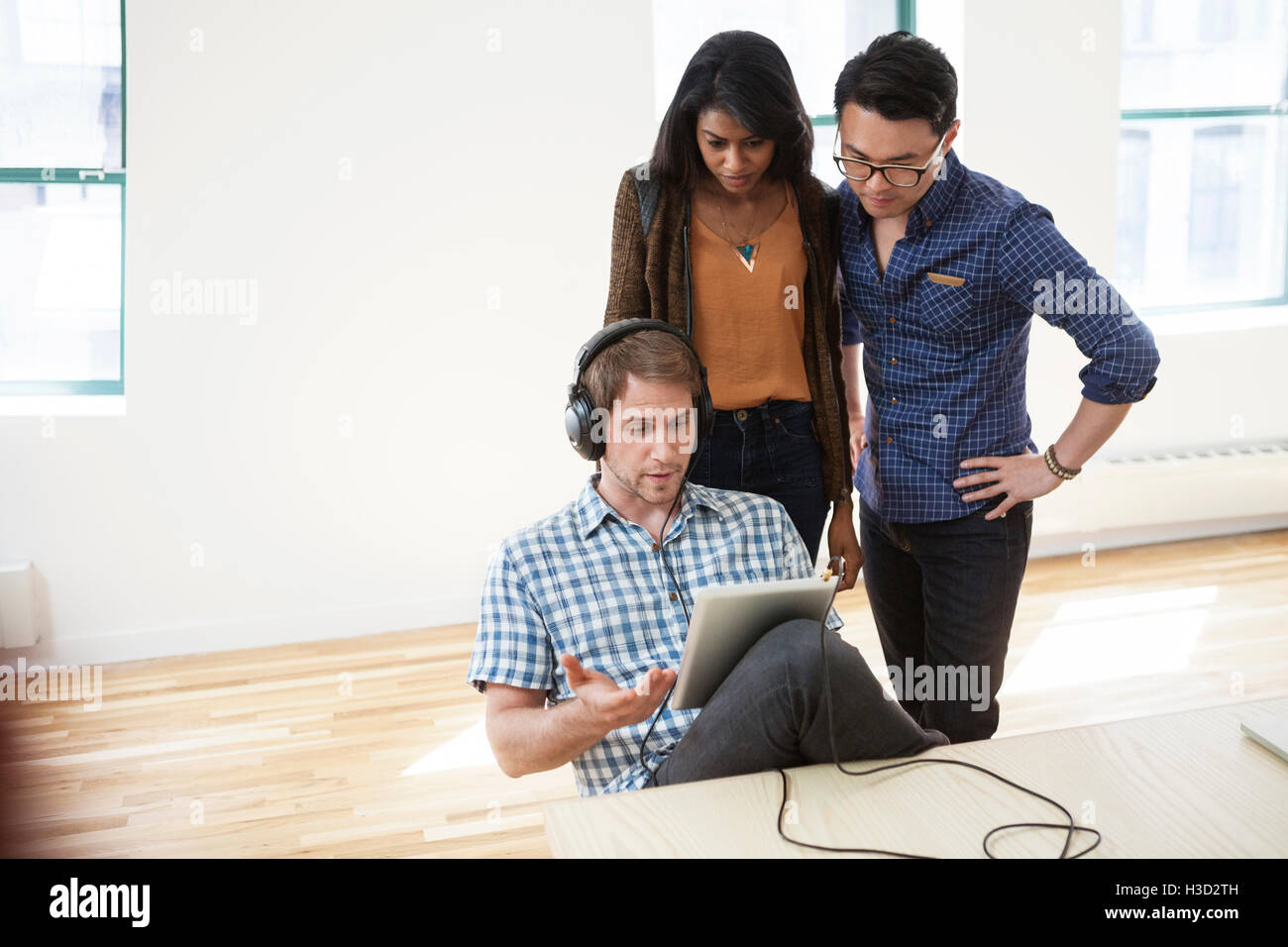 business people using tablet computer in creative office Stock Photo ...