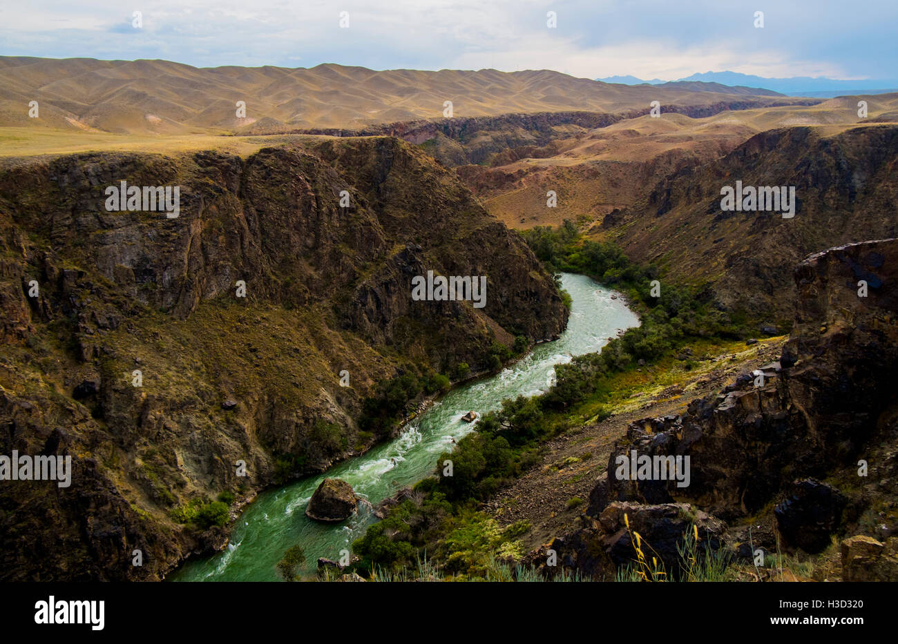 Scenic view of river in valley Stock Photo - Alamy