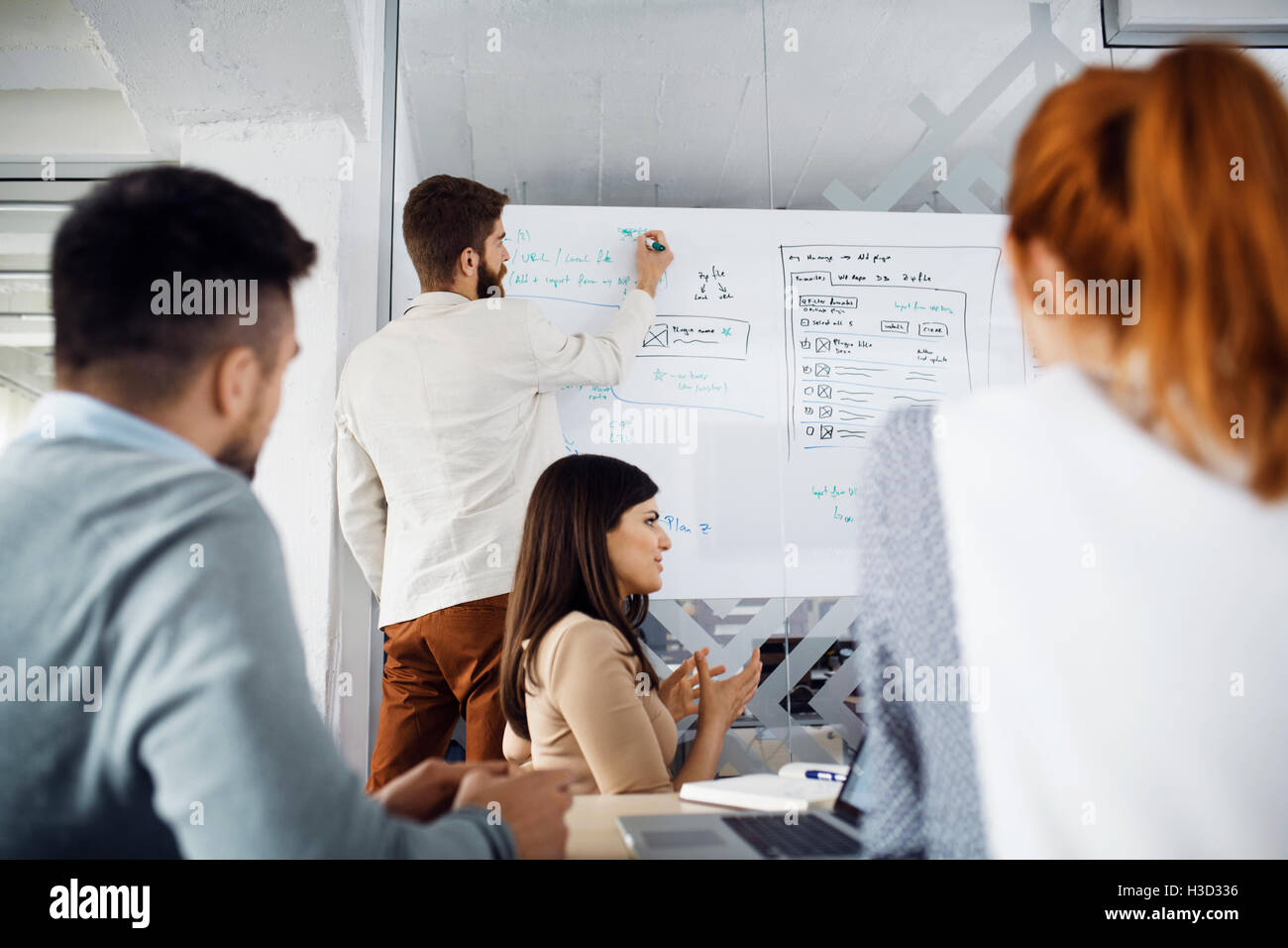 Explaining new strategy hi-res stock photography and images - Alamy