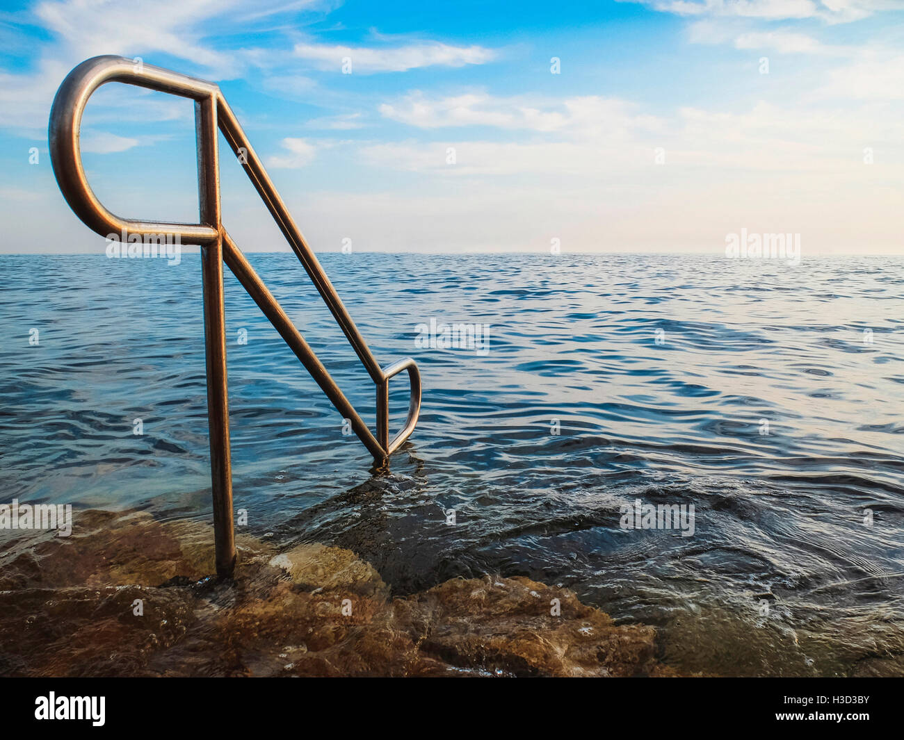 Railing on shore in sea Stock Photo - Alamy