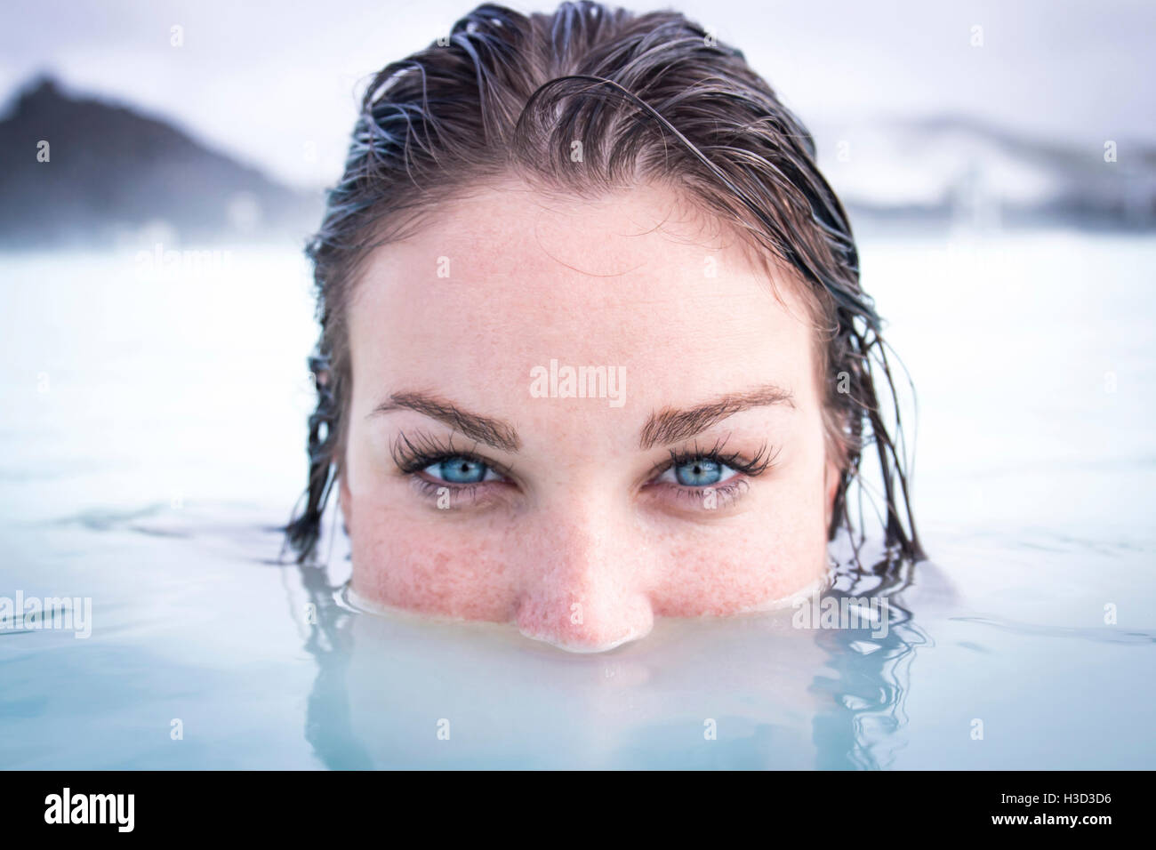 Portrait of woman swimming in sea Stock Photo - Alamy