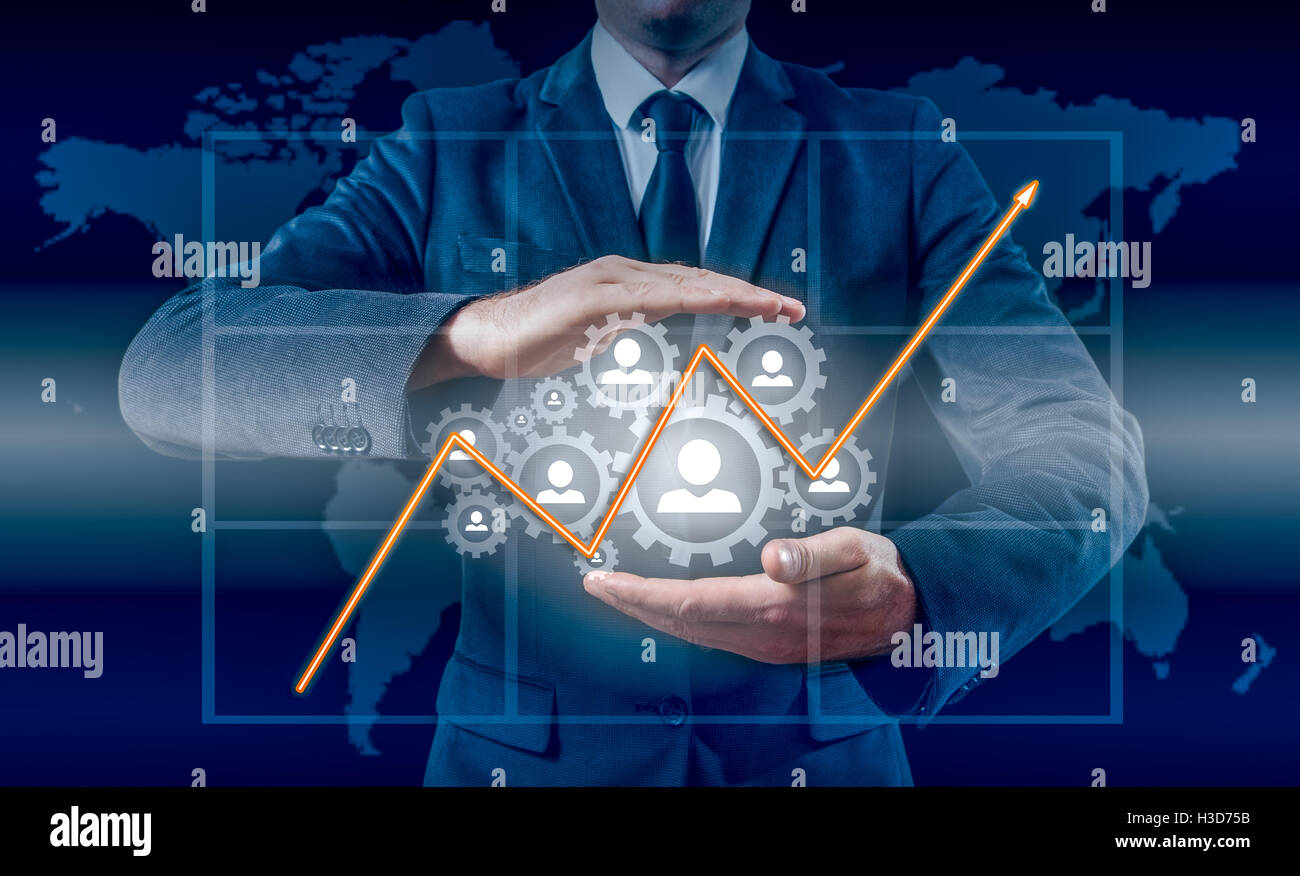 Businessman holding a concept of the increase and growth of statistics ...