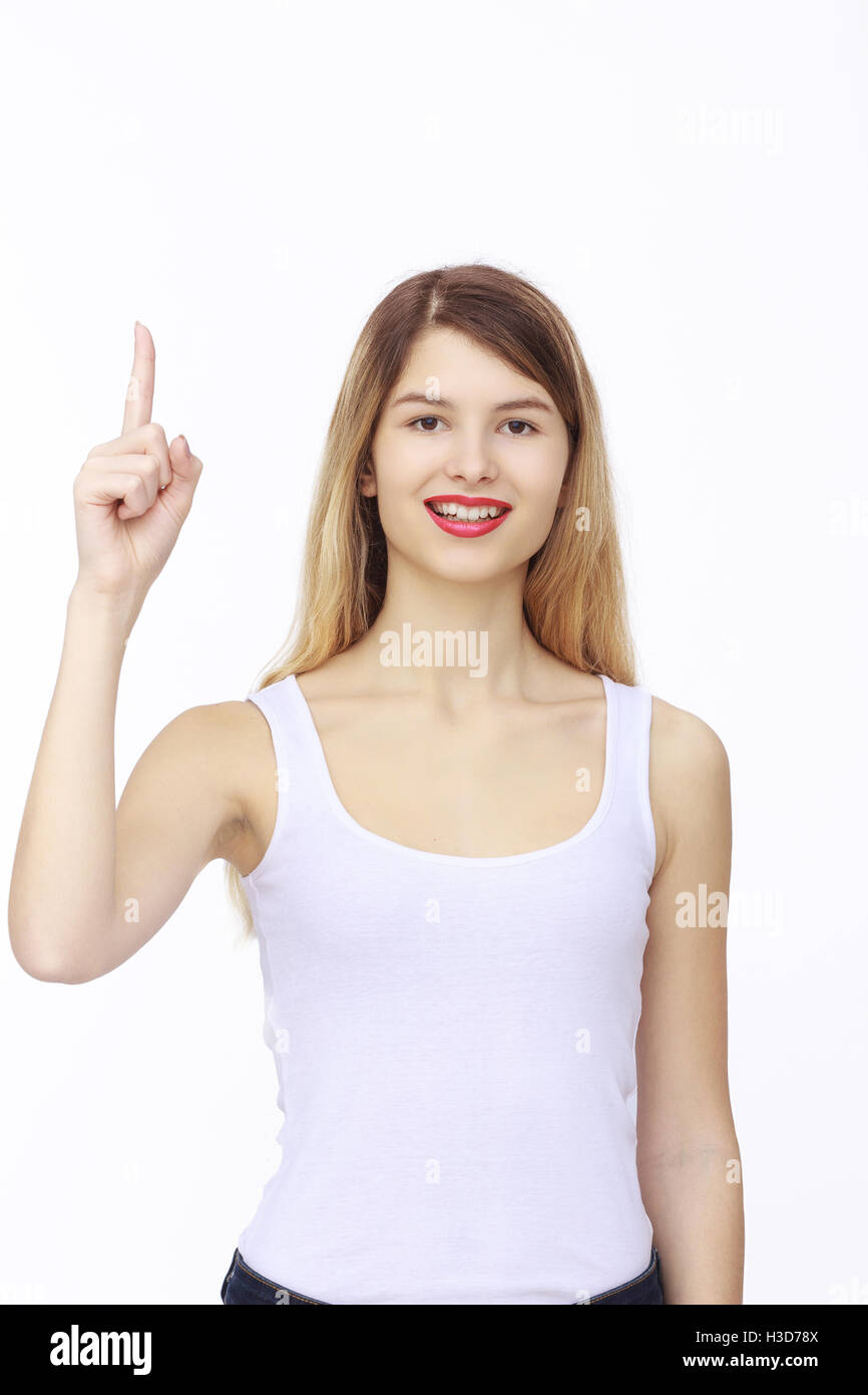 Attractive woman pointing up Stock Photo - Alamy