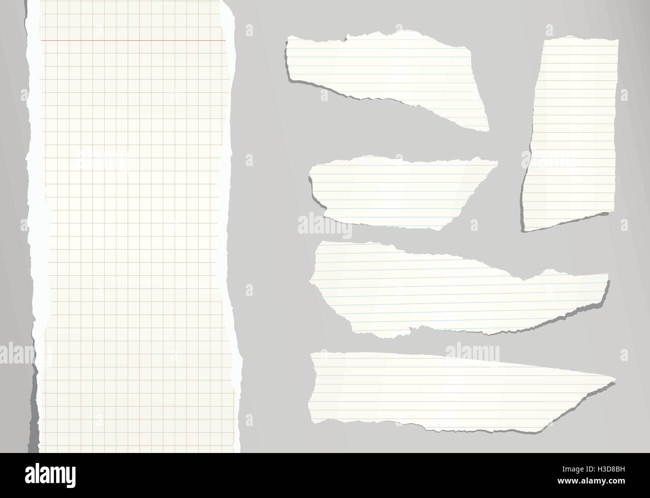 Pieces of ripped light brown note, notebook paper sheets stuck on grey ...