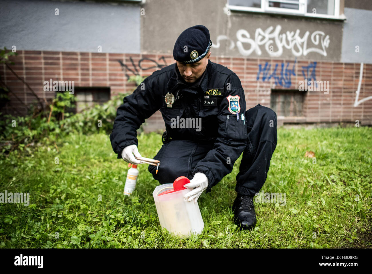 syringe needle, Ostrava Municipal Police officer Stock Photo - Alamy
