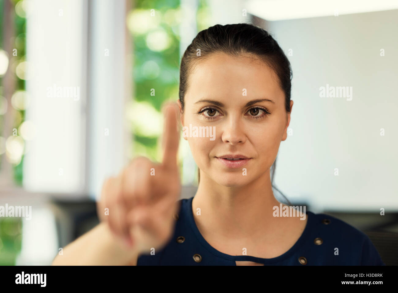 hand pushing a digital screen on office background Stock Photo - Alamy