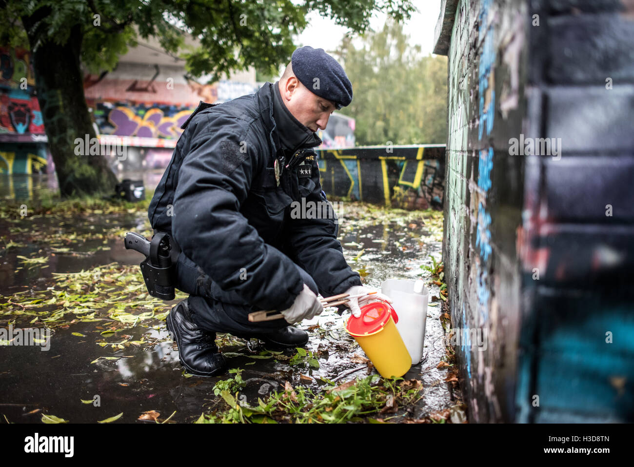 syringe needle, Ostrava Municipal Police officer Stock Photo - Alamy