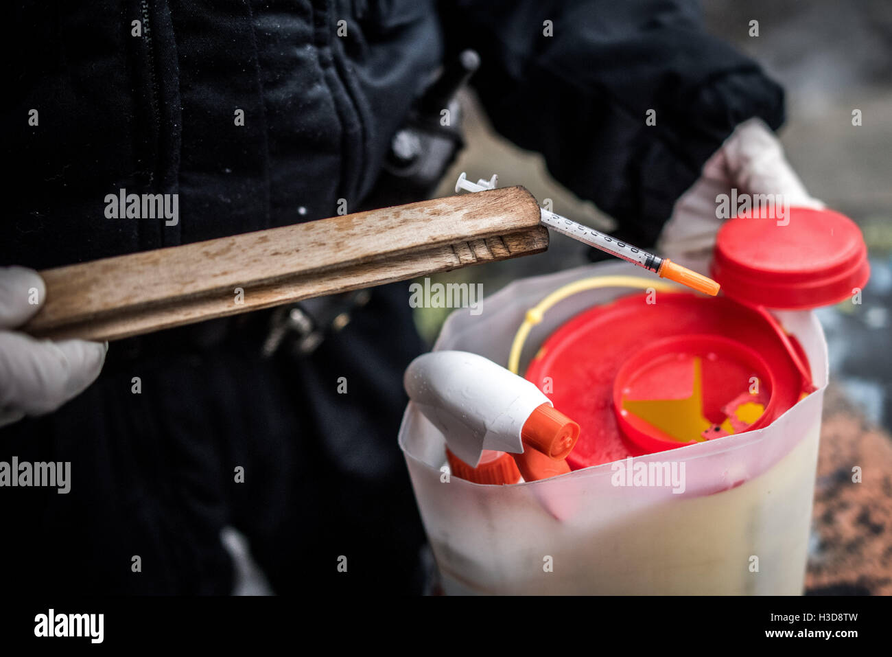 syringe needle, Ostrava Municipal Police officer Stock Photo - Alamy