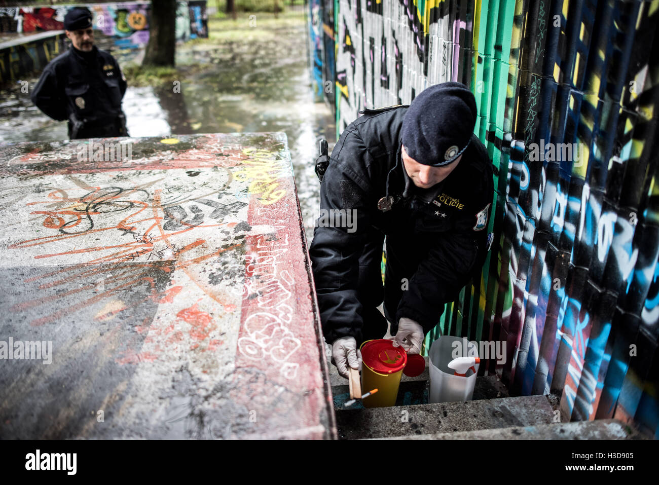 syringe needle, Ostrava Municipal Police officer Stock Photo - Alamy
