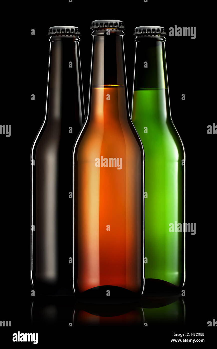 Set of beer bottles isolated on black background Stock Photo - Alamy
