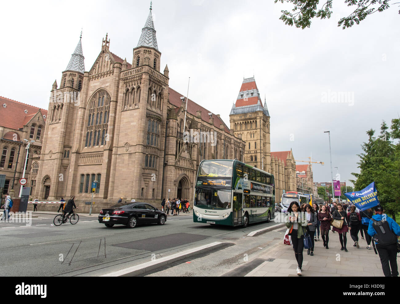 Manchester University main campus building at Oxford road with students ...