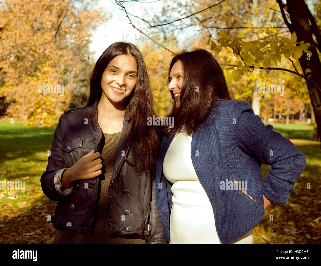 mature real mother with daughter outside autumn fall in park Stock ...