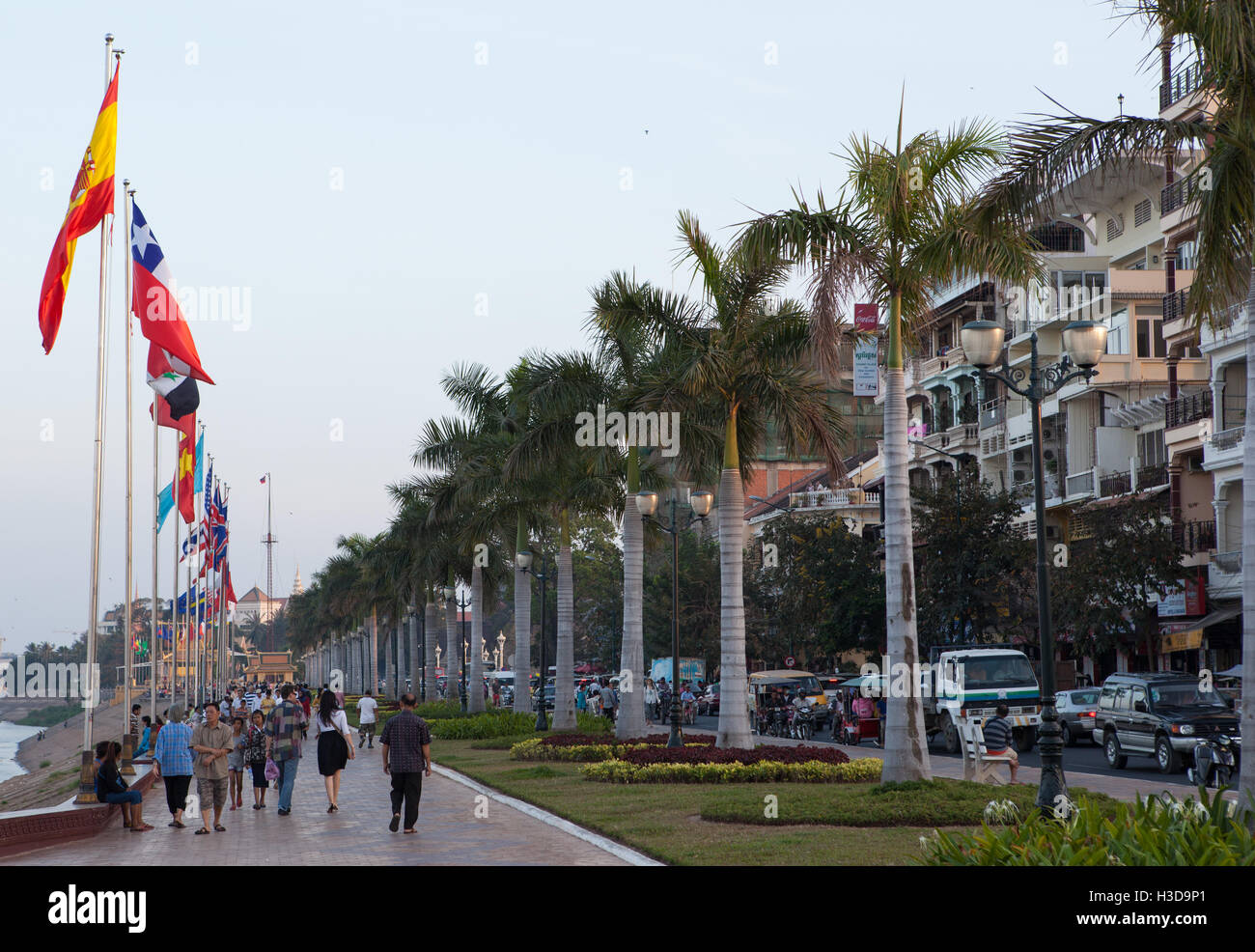People walking on Sisowath Quay promenade, Phnom Penh, Cambodia Stock ...