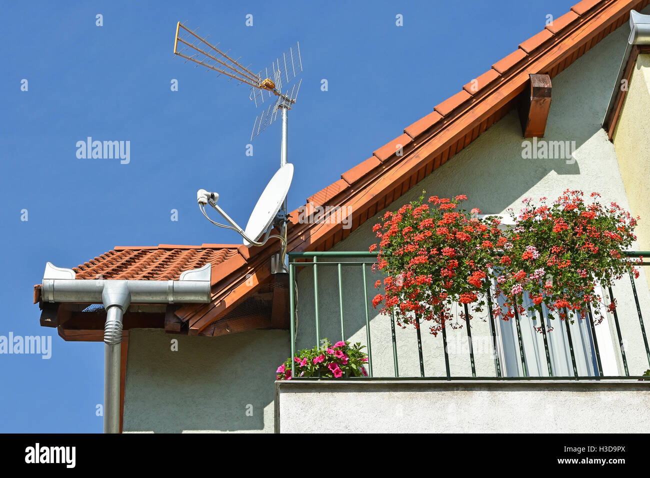 Antennas on the roof of a building Stock Photo - Alamy