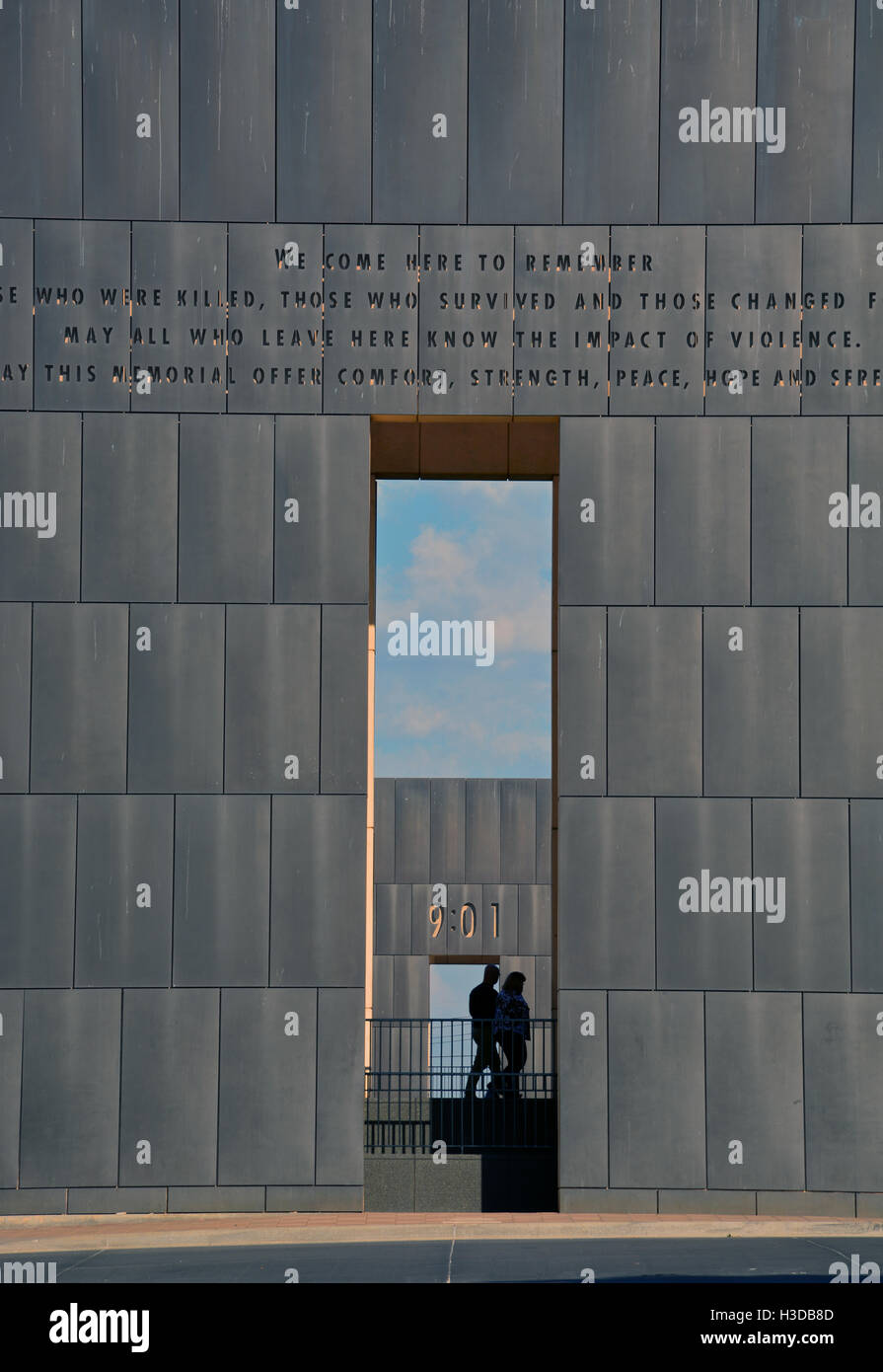 Two gates at the Oklahoma City National Memorial mark before (9:01) and ...
