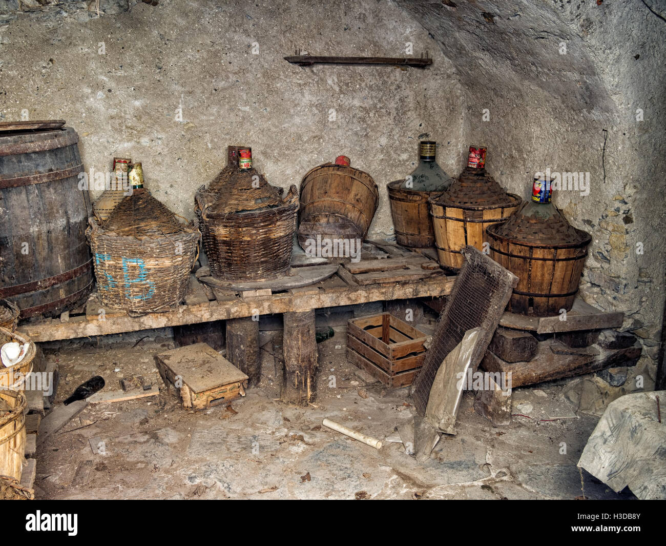 Dusty old demijohns, carboys in cellar. Rural life, heritage now ...
