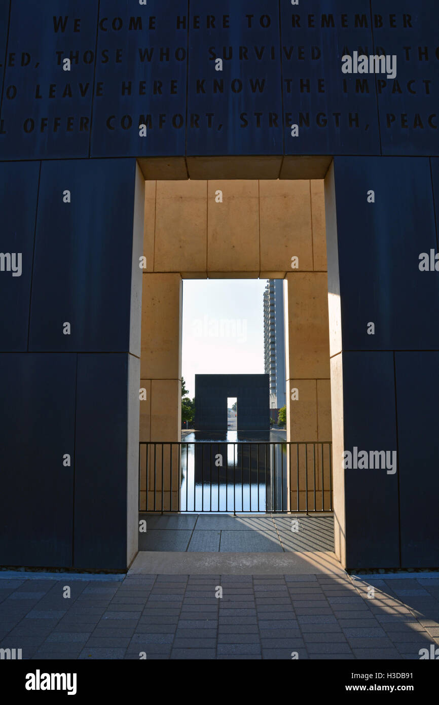 Two gates at the Oklahoma City National Memorial mark before (9:01) and ...