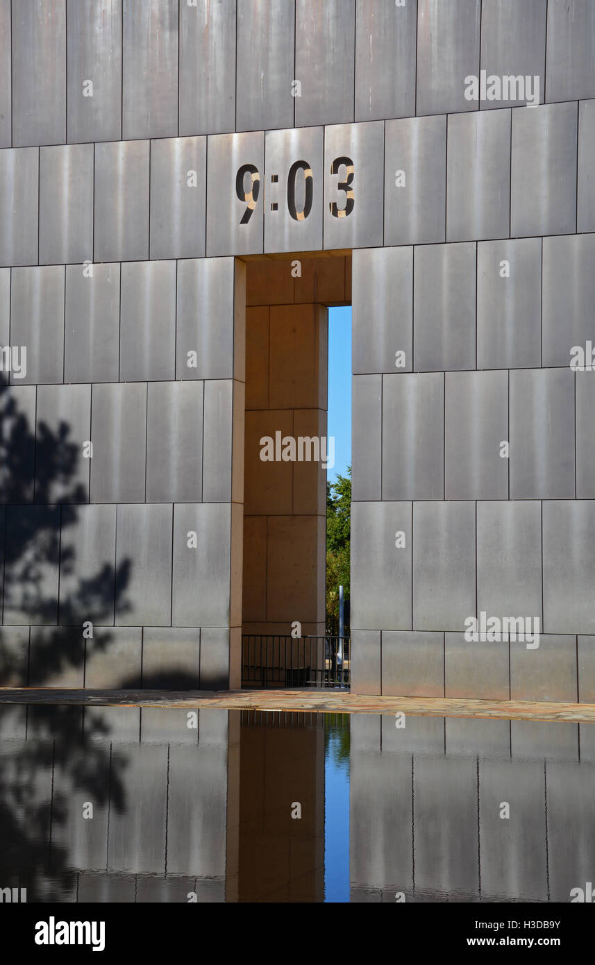 Two gates at the Oklahoma City National Memorial mark before (9:01) and ...