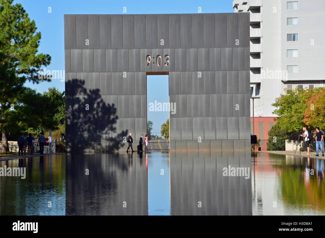 Two gates at the Oklahoma City National Memorial mark before (9:01) and ...