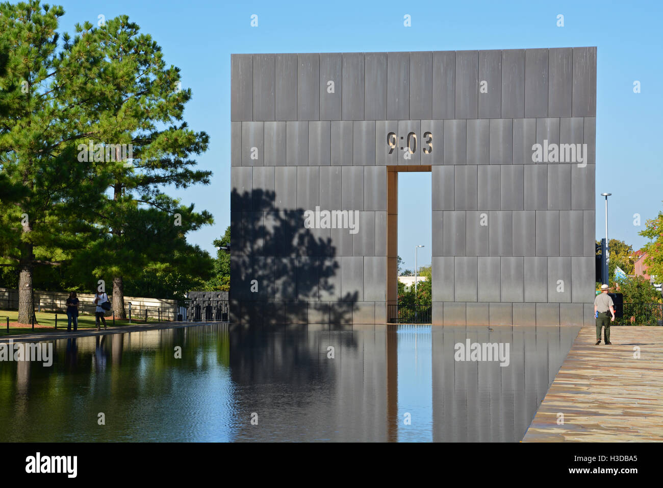 Two gates at the Oklahoma City National Memorial mark before (9:01) and ...